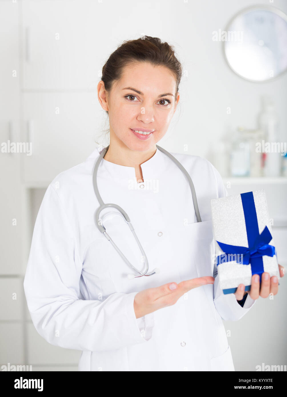 Young female Finnish doctor ready to receive clients in her office ...