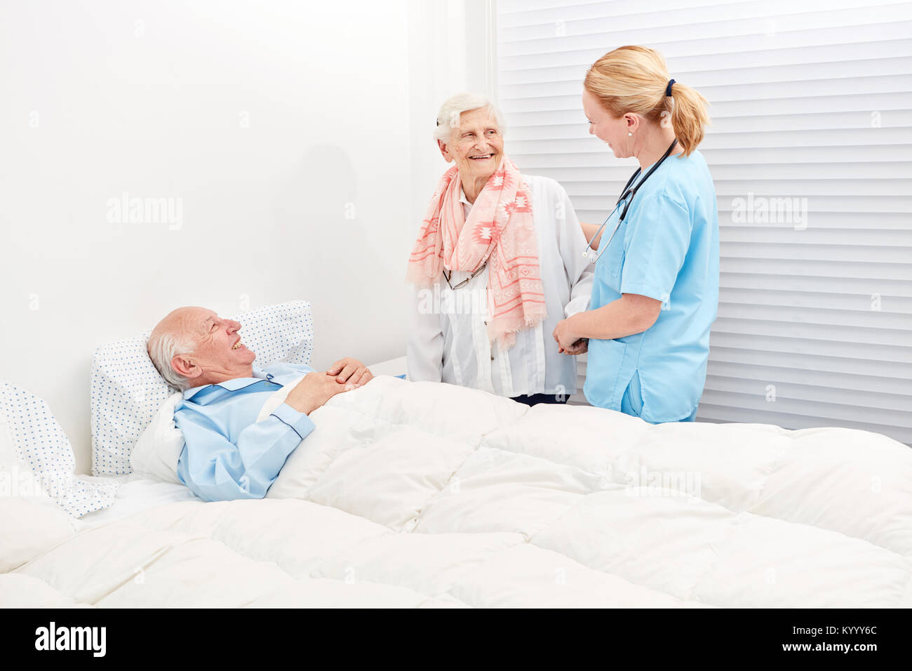 Old woman makes visit to her husband in hospital accompanied by ...