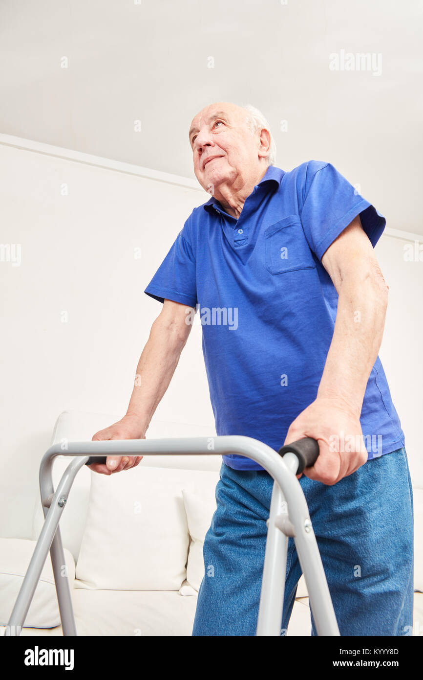 Senior learns to walk again with walker in occupational therapy in ...