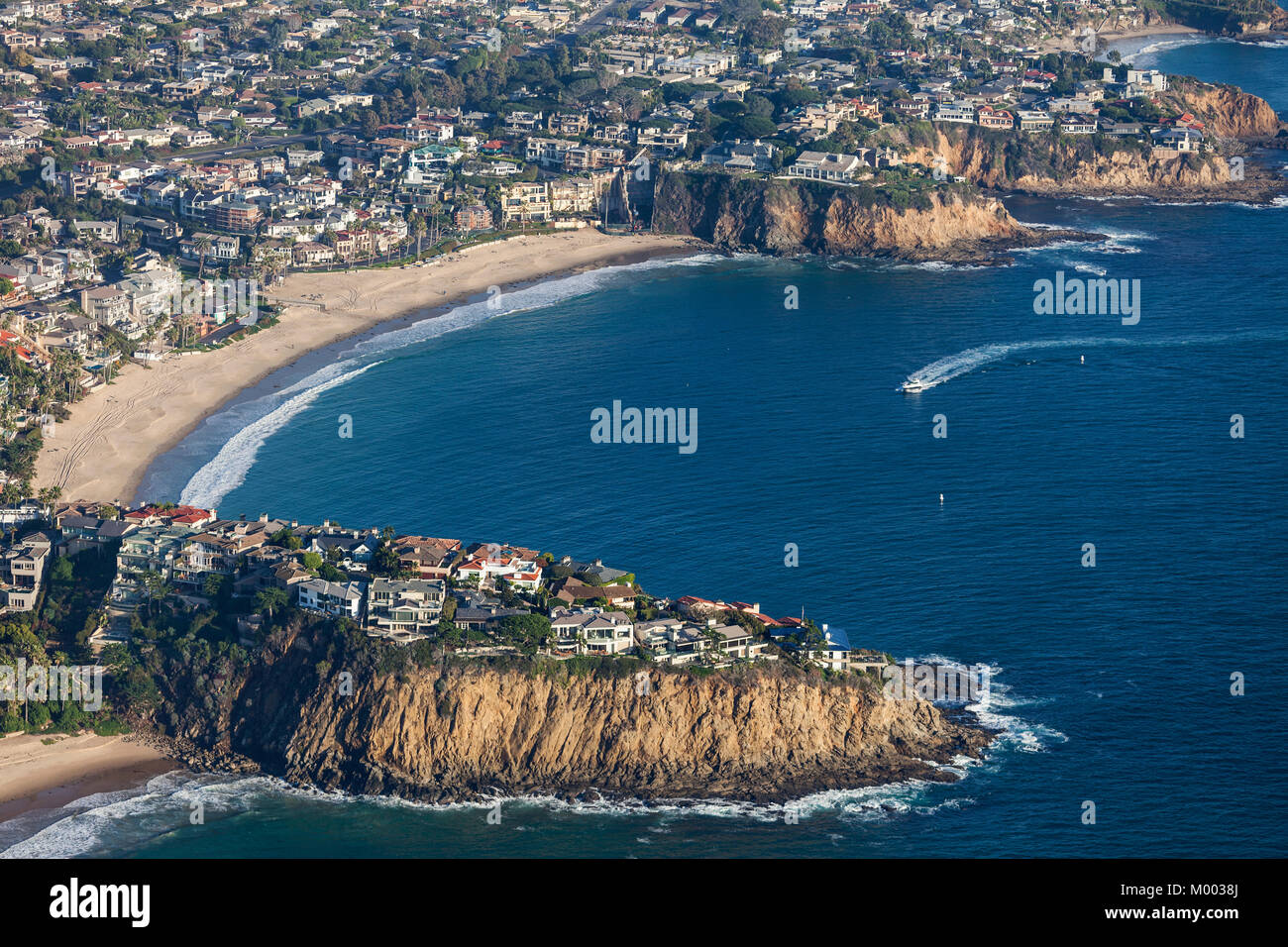 Aerial view of affluent homes surrounding scenic Emerald Cove in Laguna ...