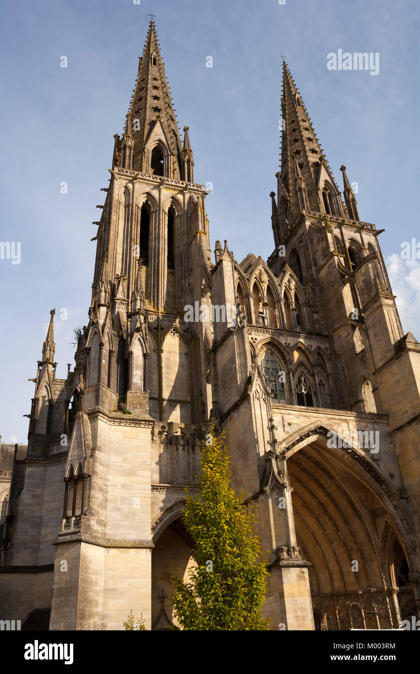 Looking up at the twin spires of the cathedral at Sees, Orne, Normandy ...
