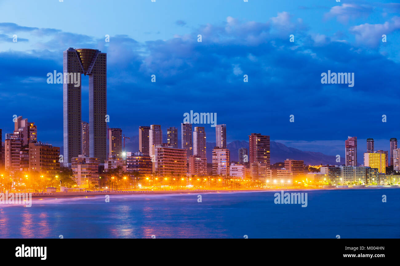 night panoramic view on lights of Benidorm city with seafront and ...