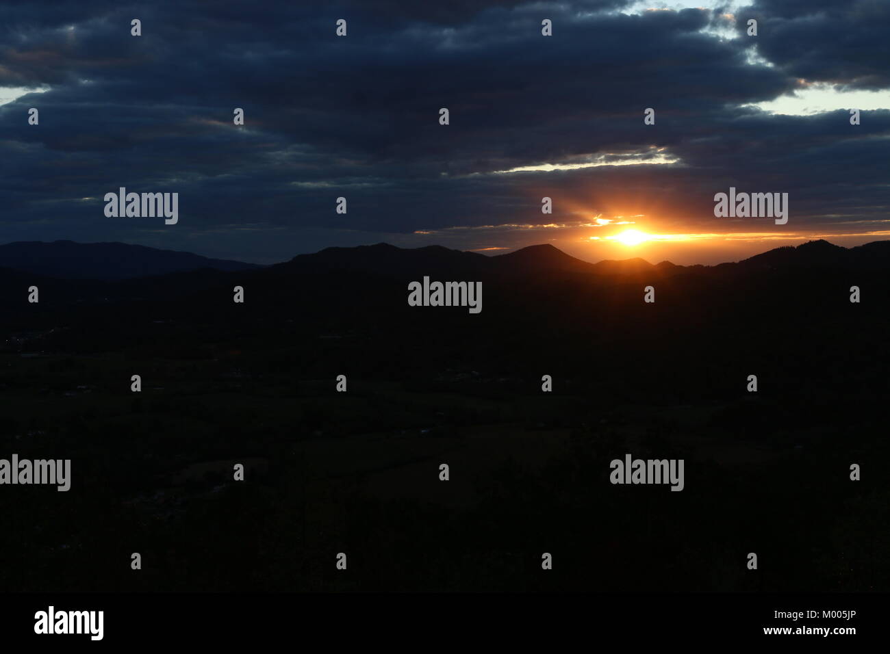 Sunset with dark sky from view in Wears Valley Stock Photo - Alamy