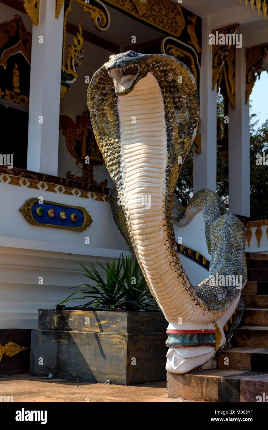 Naga statue at the entrance to building Stock Photo - Alamy