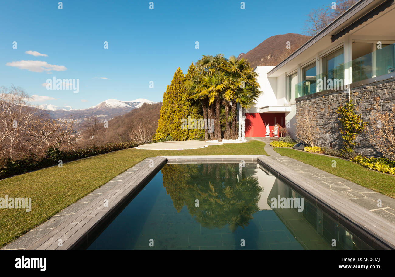 Modern house with swimming pool, outdoor Stock Photo - Alamy