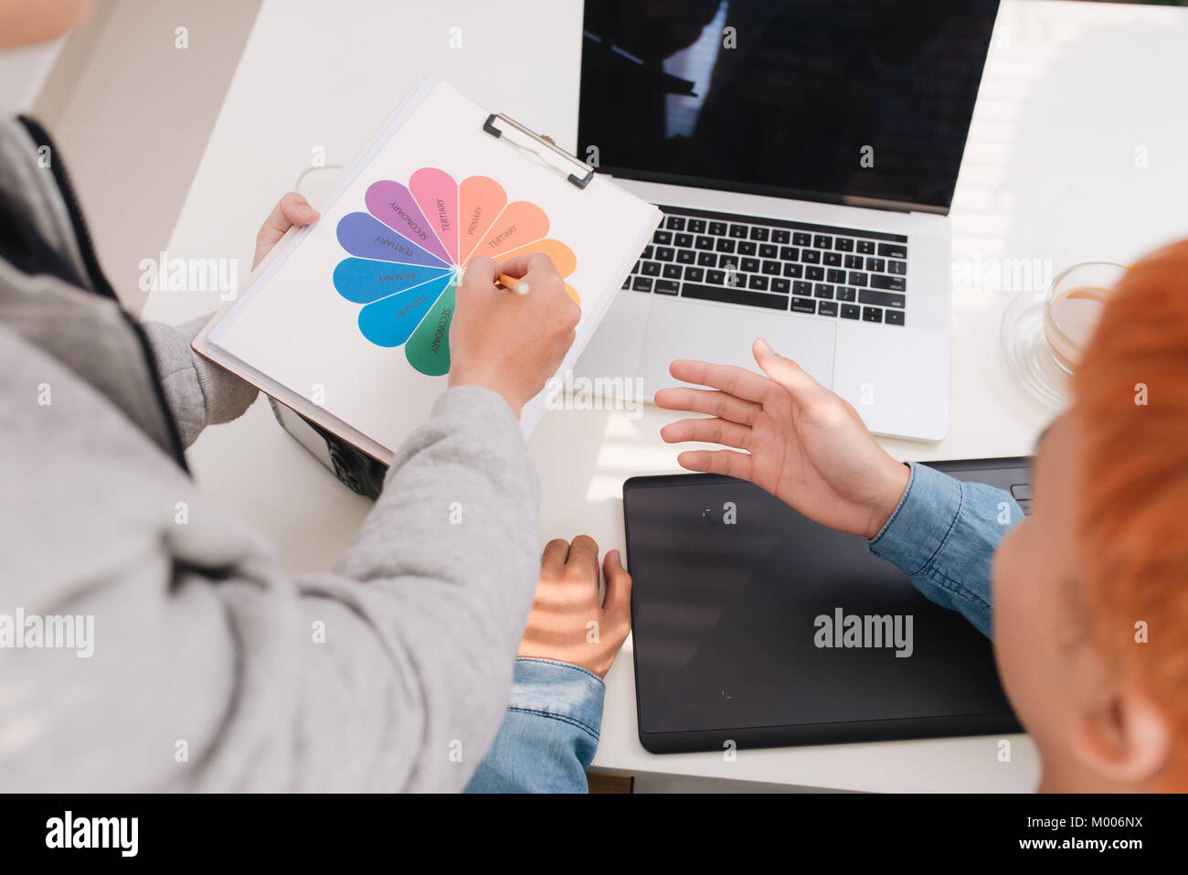 Coworking process, designers team working on computer in modern office ...