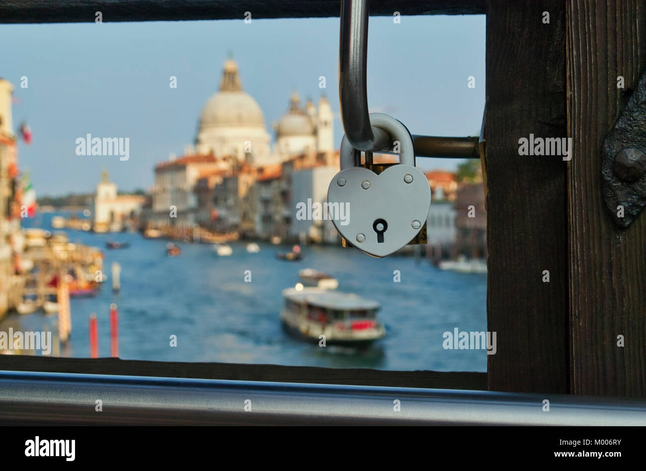 Heart shaped love lock on a bridge in Venice Italy Stock Photo - Alamy