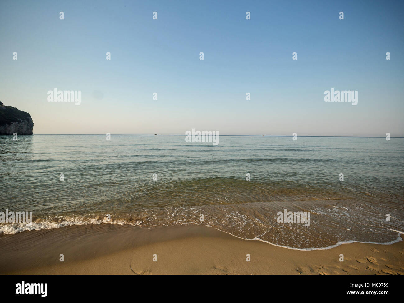 view of the split mountain and Serapo beach in Gaeta, peninsula in ...