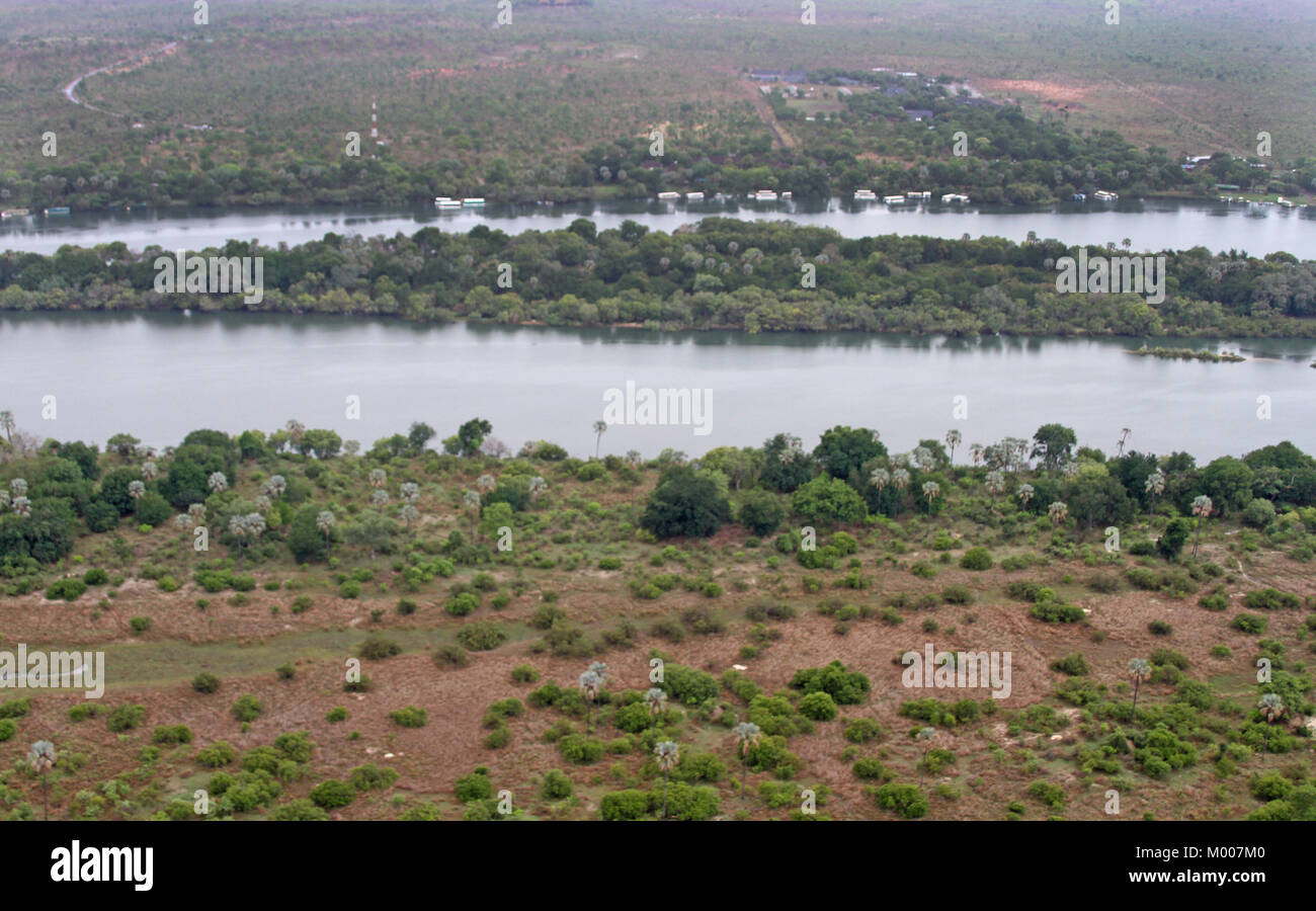 Aerial view of a small island on the Zambezi River seperating Zambia ...