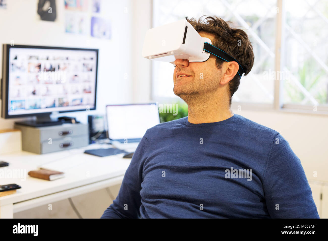Man with VR goggles, virtual reality glasses Stock Photo - Alamy