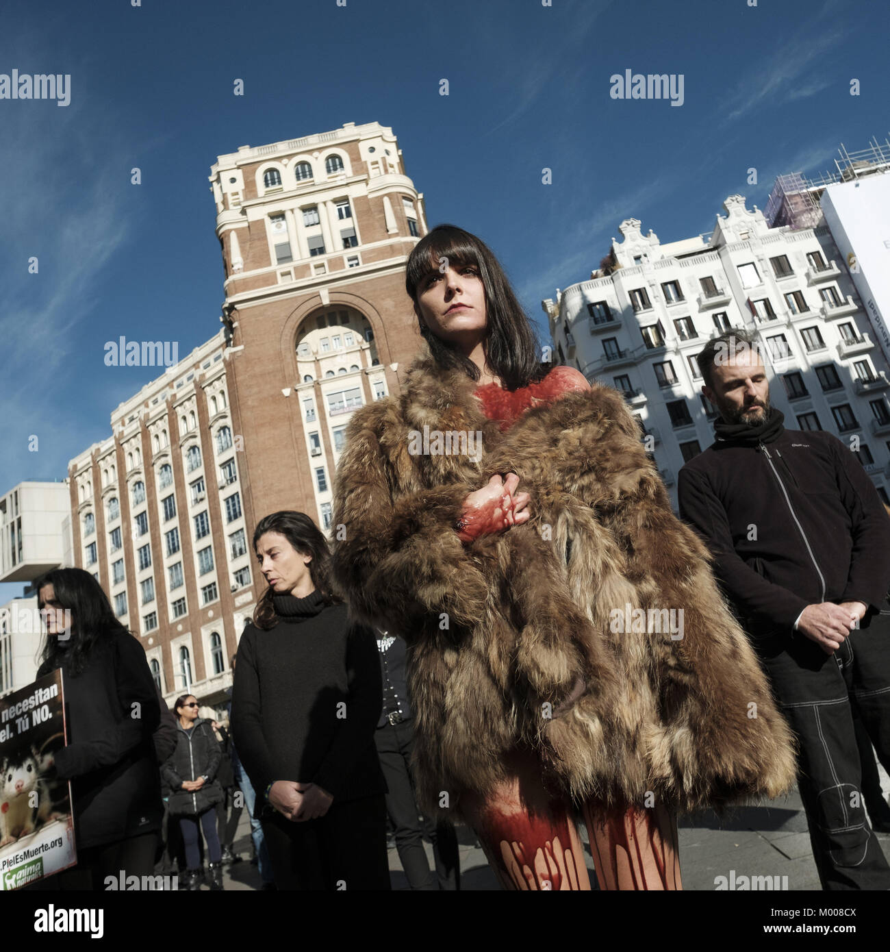 Wears a fake fur coat during a demonstration to protest against hi-res ...