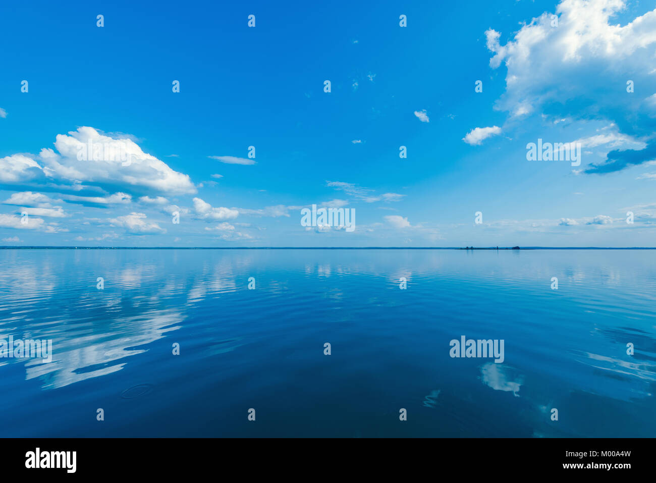 View of the lake at windless weather time Stock Photo - Alamy