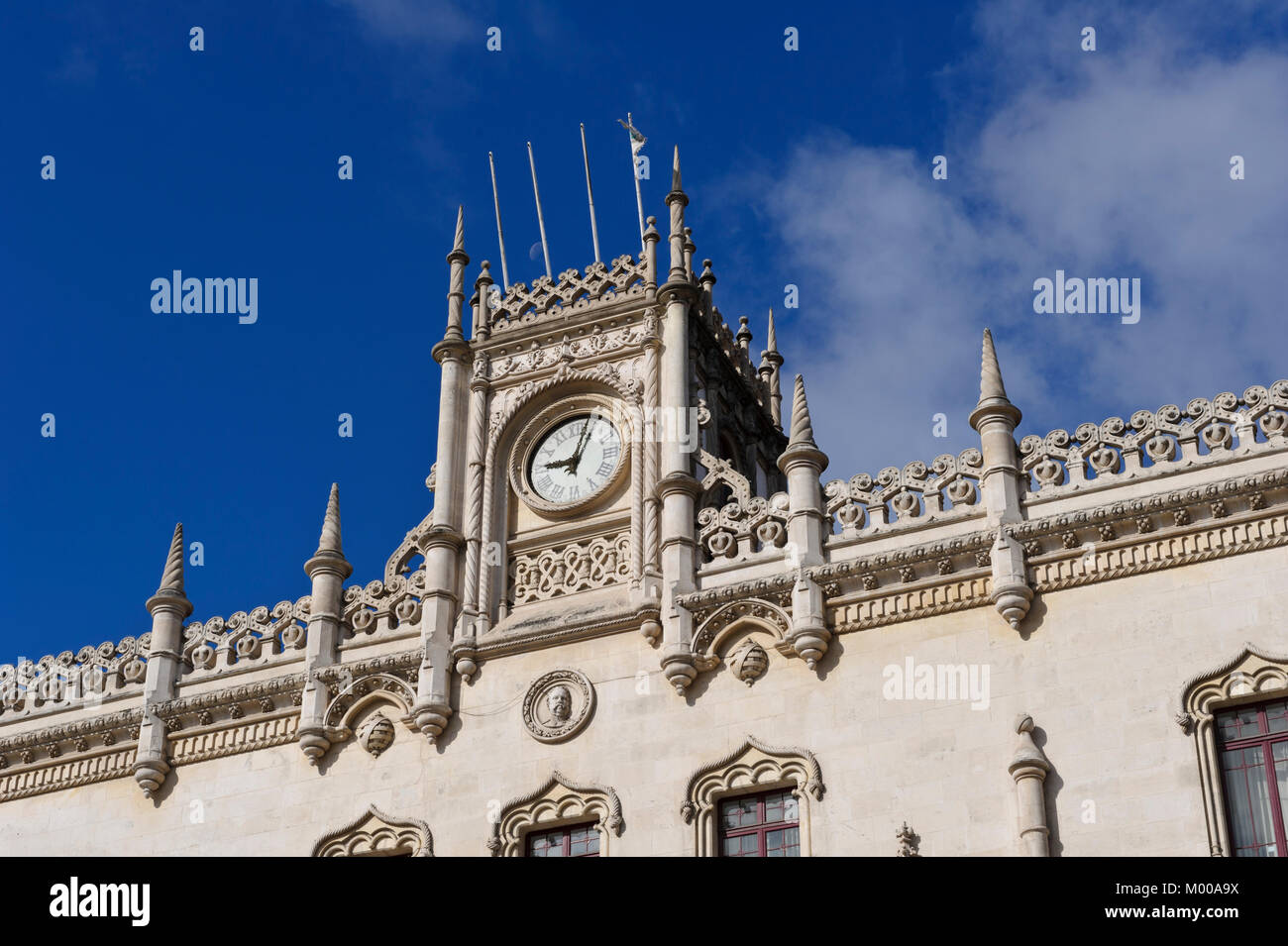 The clock of the Rossio Railway Station in Lisbon, Portugal Stock Photo ...