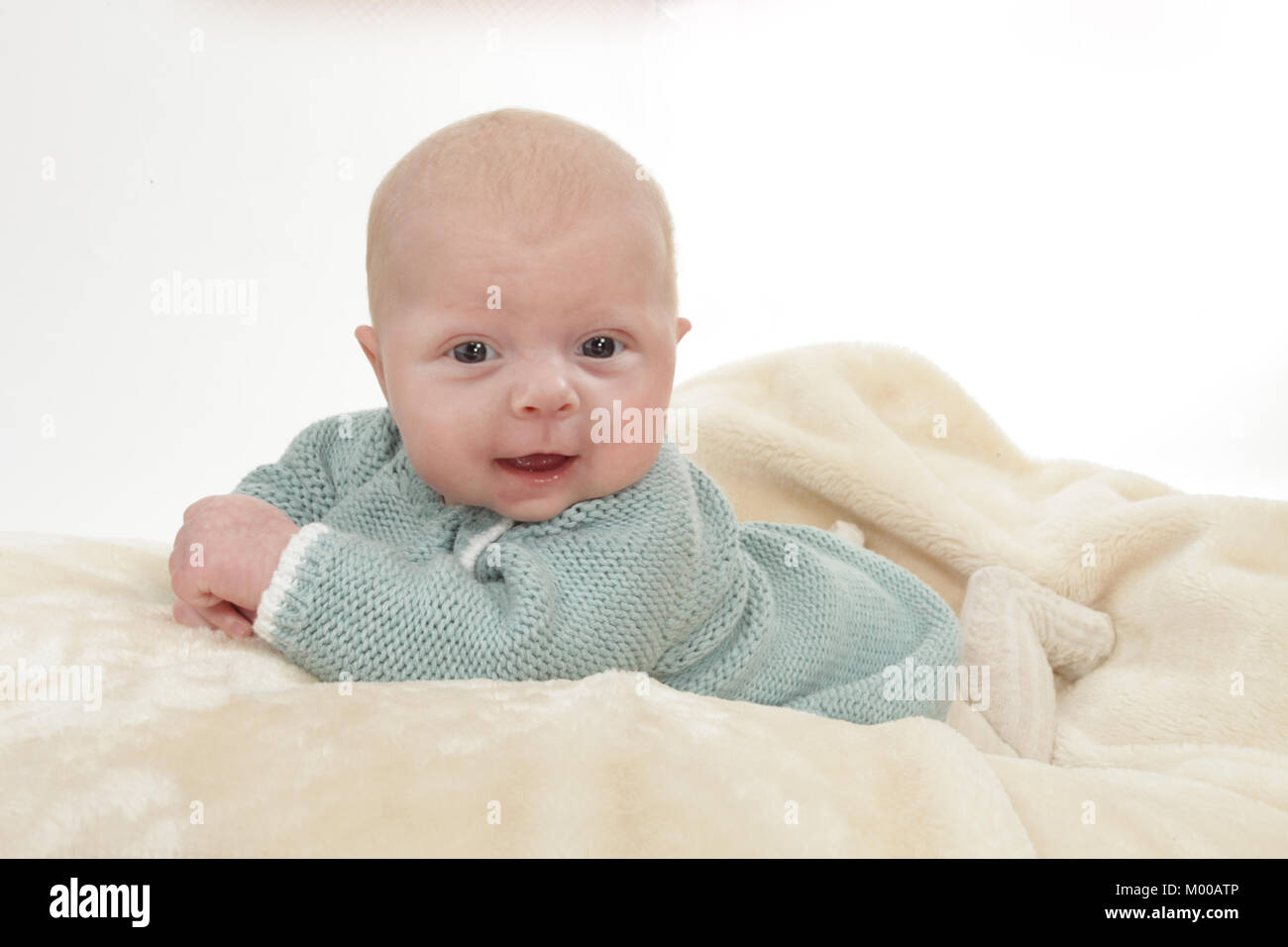 baby girl 13 weeks old playing in nursery on blanket Stock Photo - Alamy