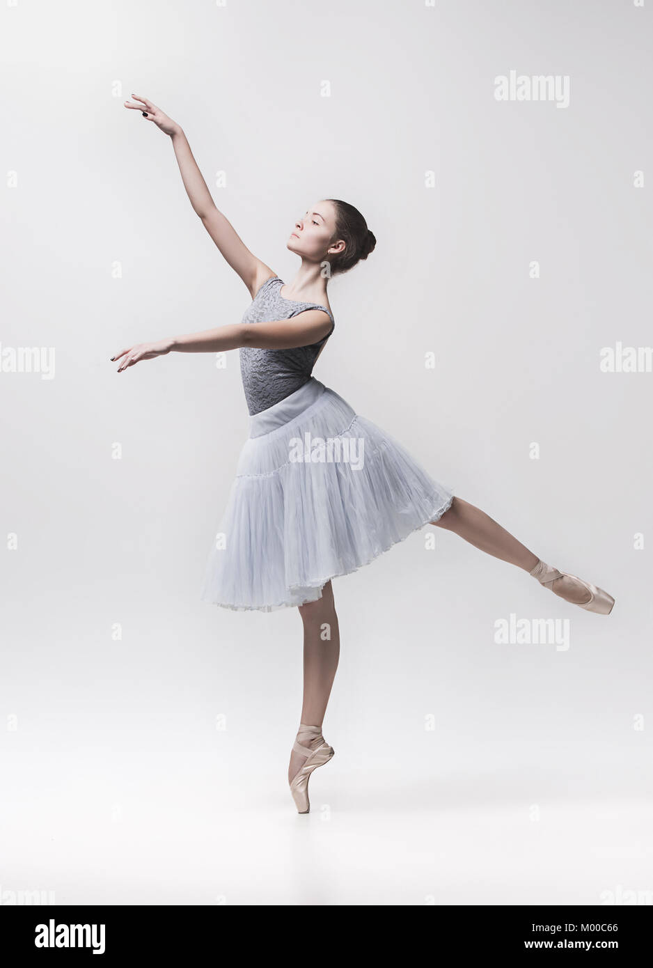 Young classical dancer isolated on white background Stock Photo - Alamy