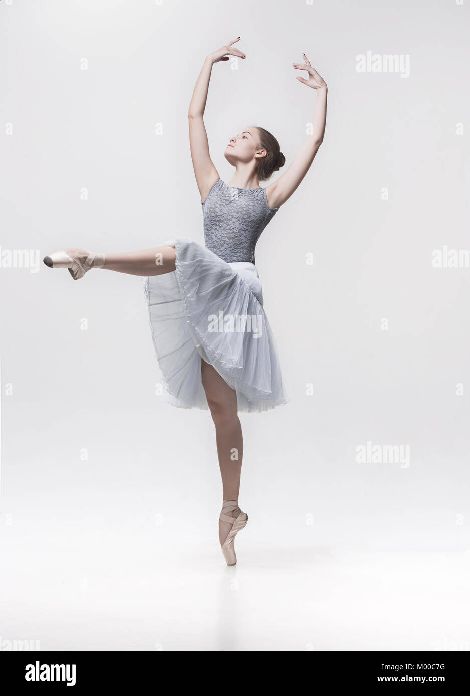 Young classical dancer isolated on white background Stock Photo - Alamy