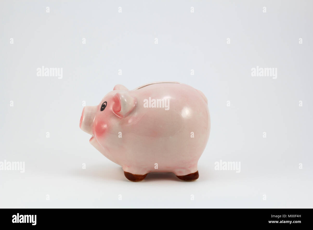 Ceramic pig piggy box, isolated in a white background Stock Photo - Alamy