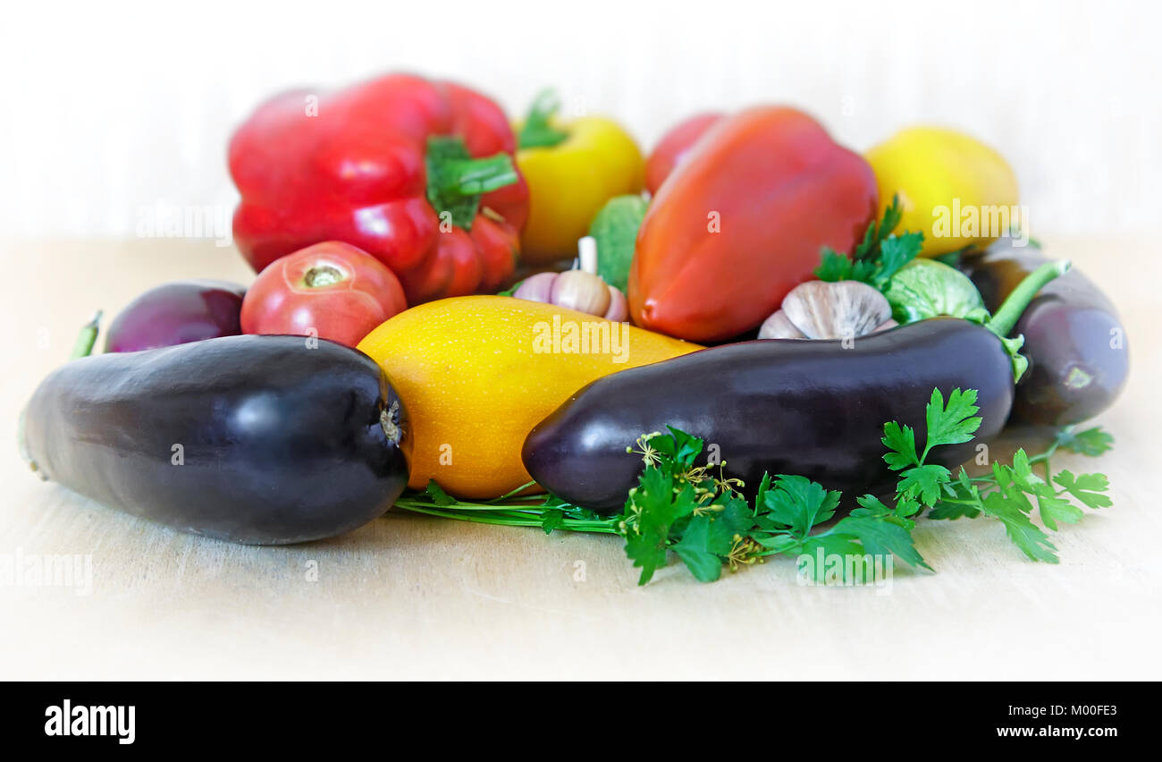 Group of different vegetables: cucumbers, eggplants, tomatoes, pumpkins ...