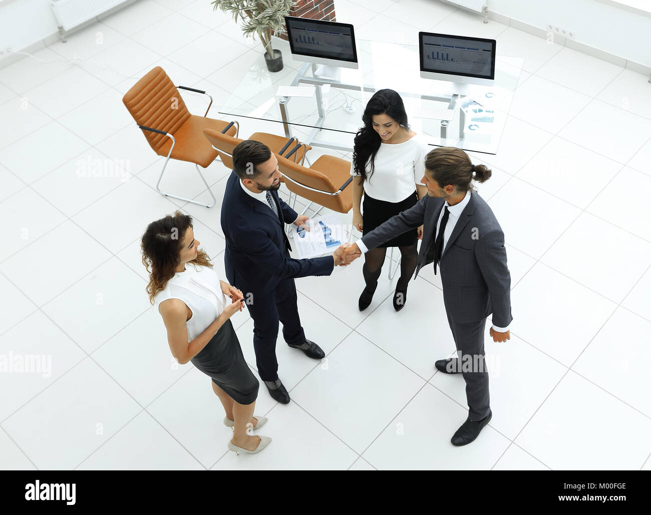 view from the top.the handshake business partners Stock Photo - Alamy