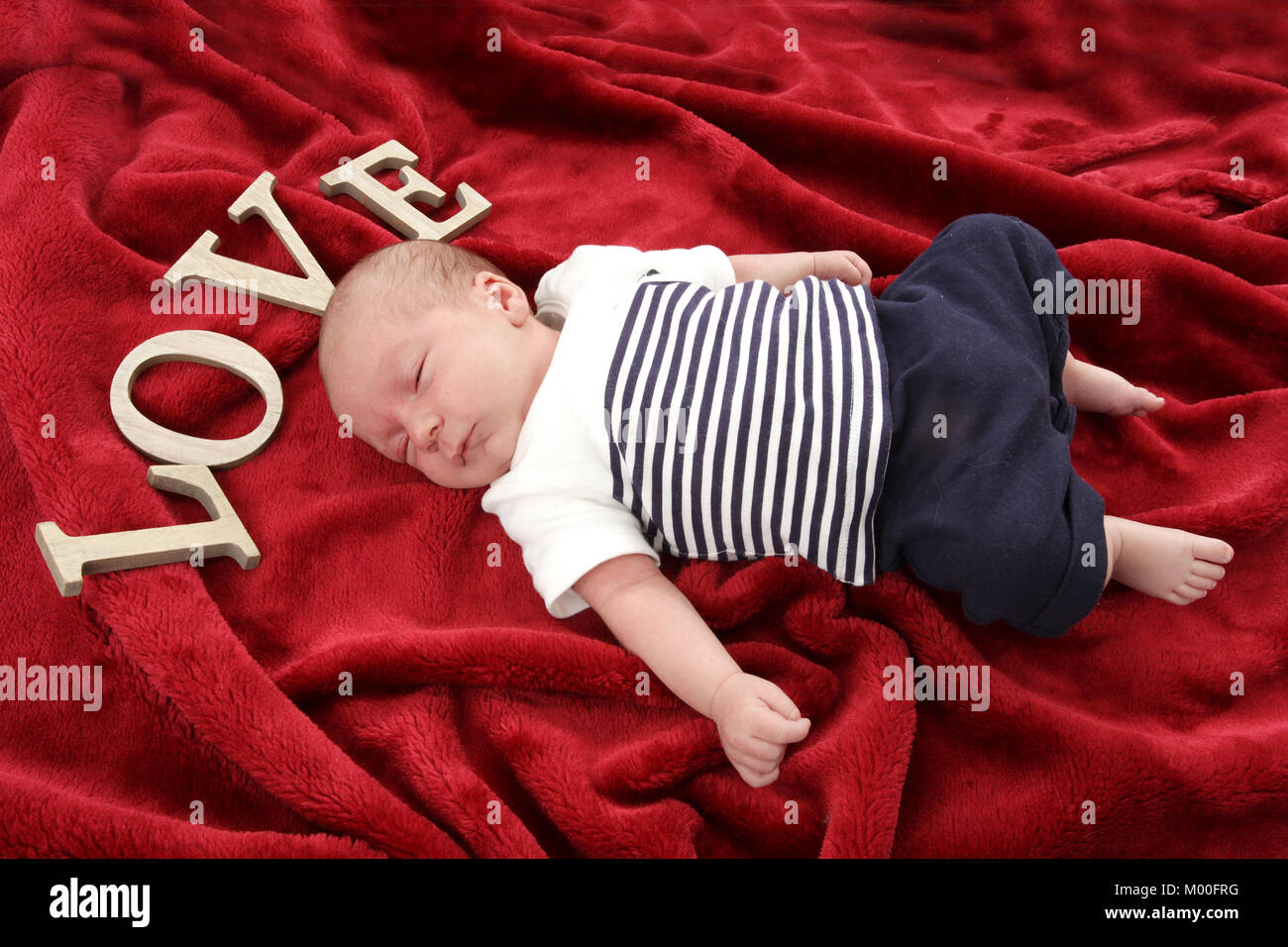 4 week old baby boy bed hi-res stock photography and images - Alamy