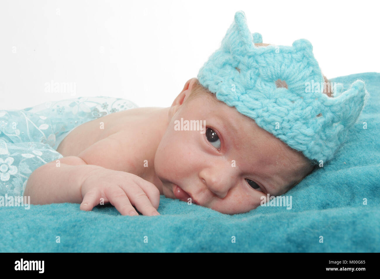 beautiful 4 week old baby boy on tummy, relaxing time Stock Photo - Alamy