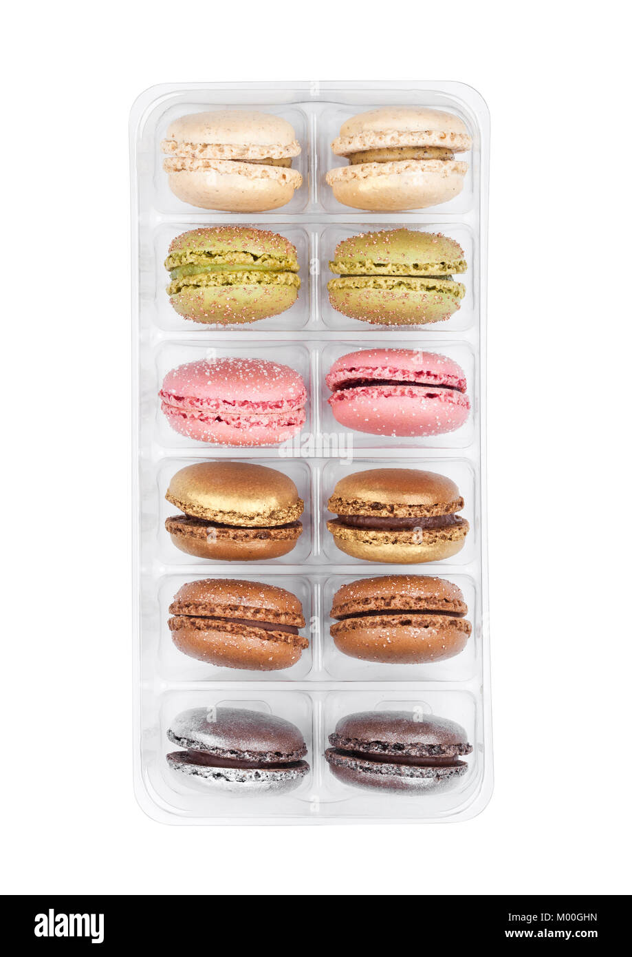 French colorful macarons dessert cakes in plastic tray on white ...