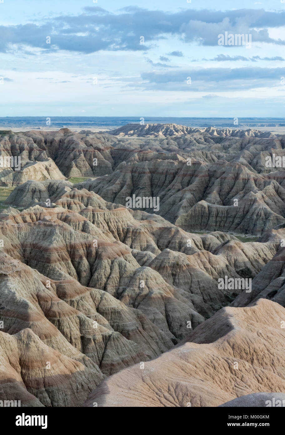Erosion has formed numerous valleys out of soft sandstone Stock Photo ...
