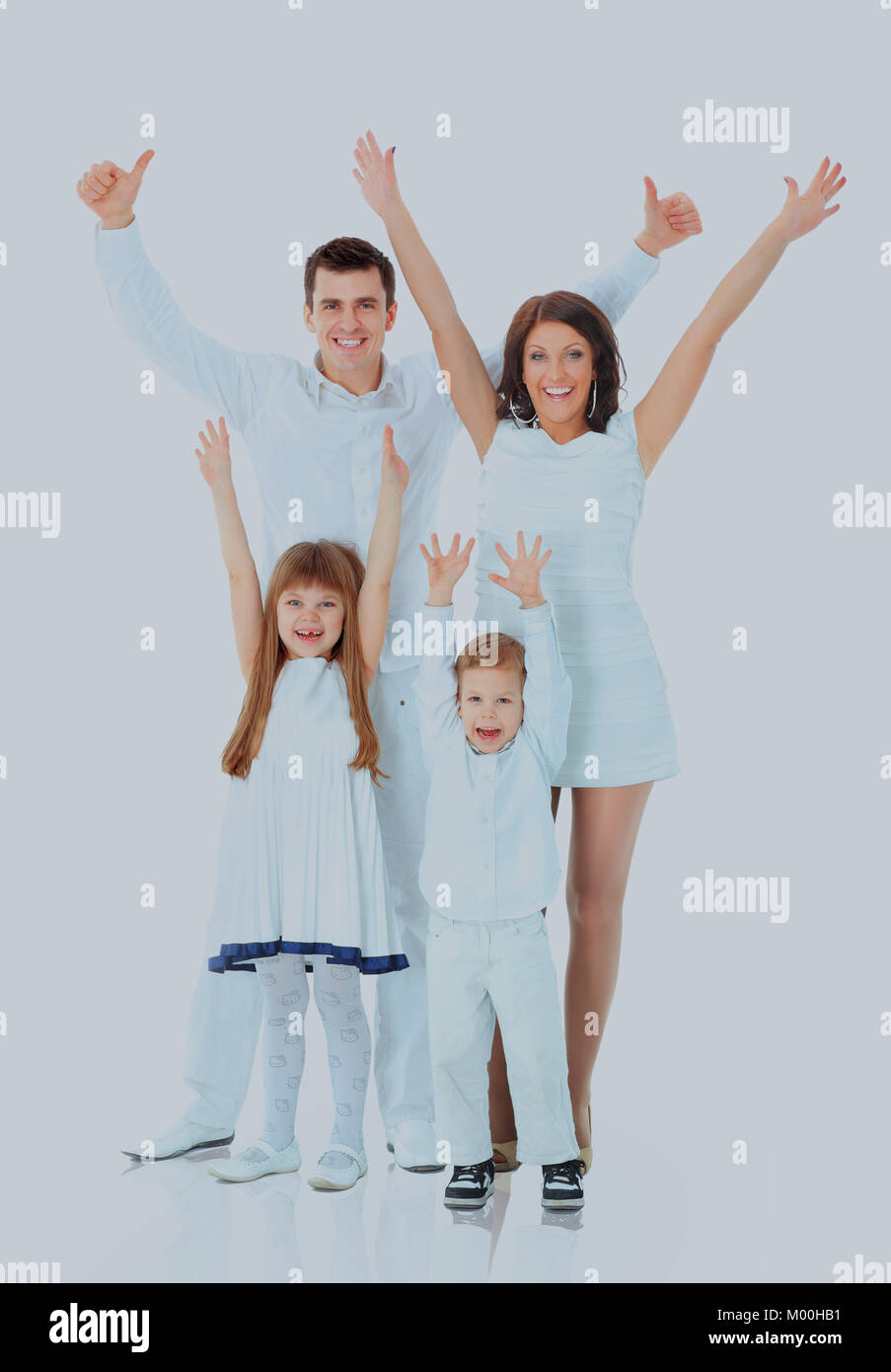 Happy family smiling. Isolated over a white background Stock Photo - Alamy