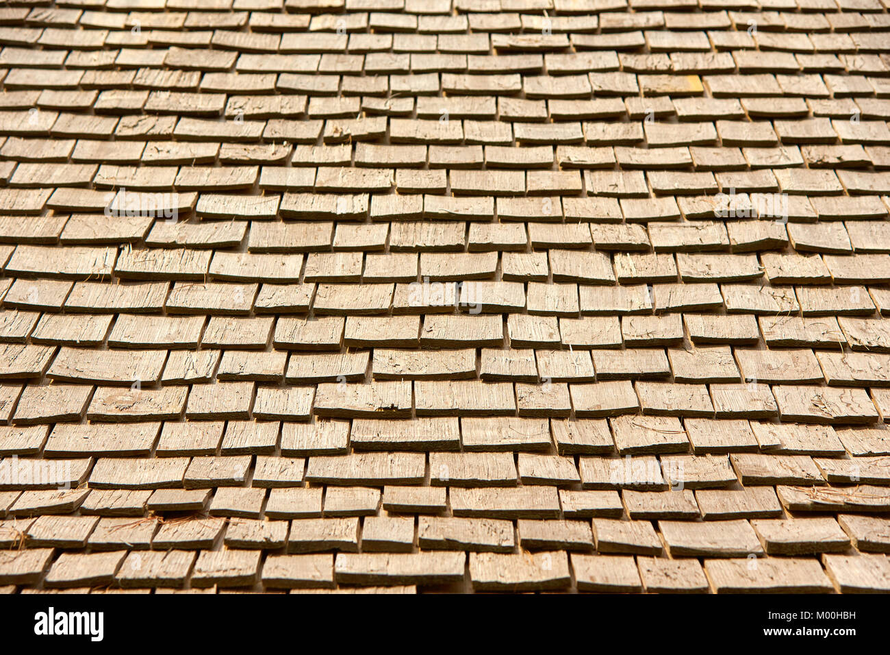 Wooden roof tiles on a farm building Stock Photo - Alamy