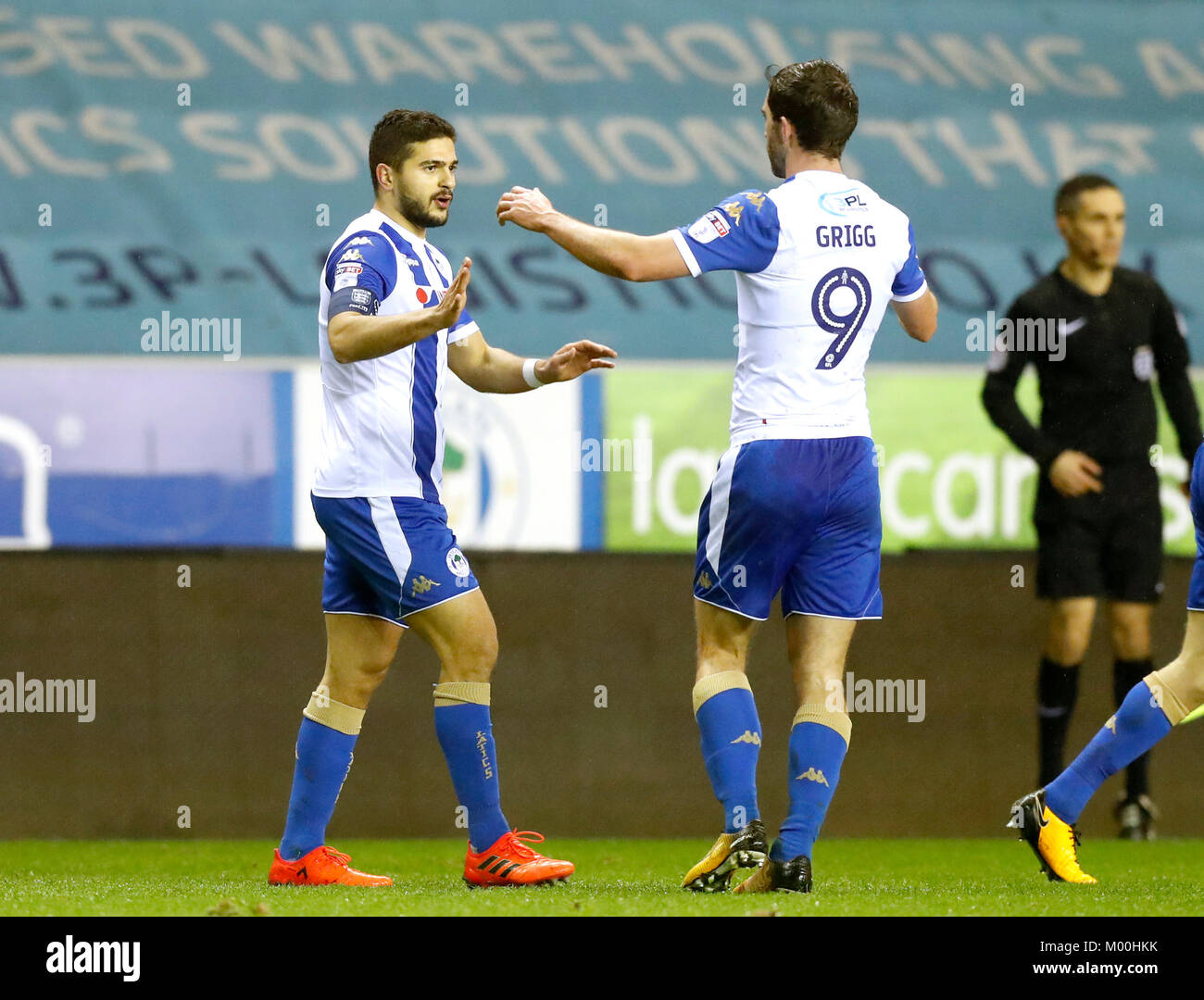 Wigan Athletic's Sam Morsy (left) celebrates scoring his side's first ...