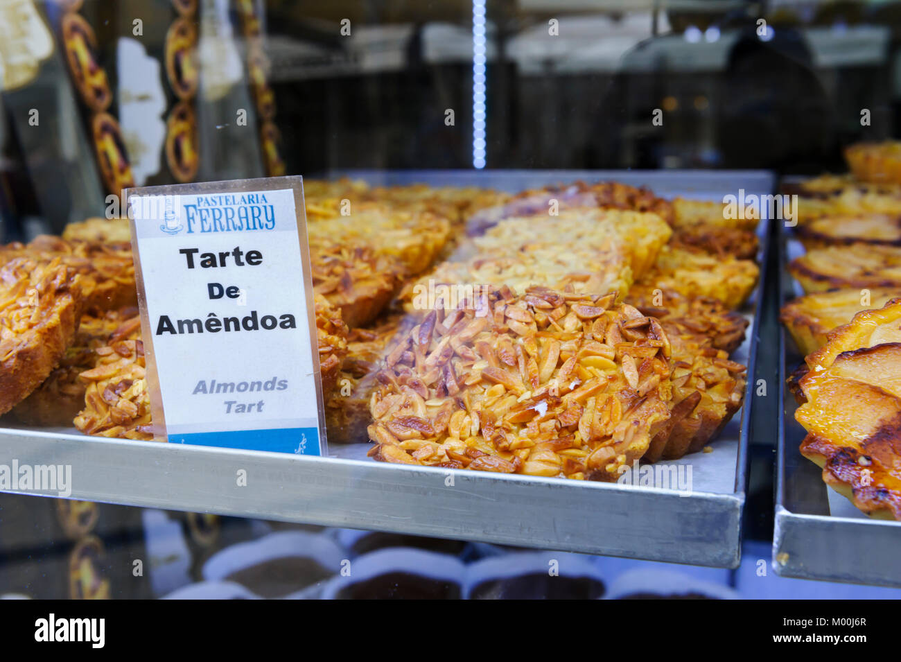 Traditional Portuguese almond tarts on sale. Lisbon, Portugal Stock ...