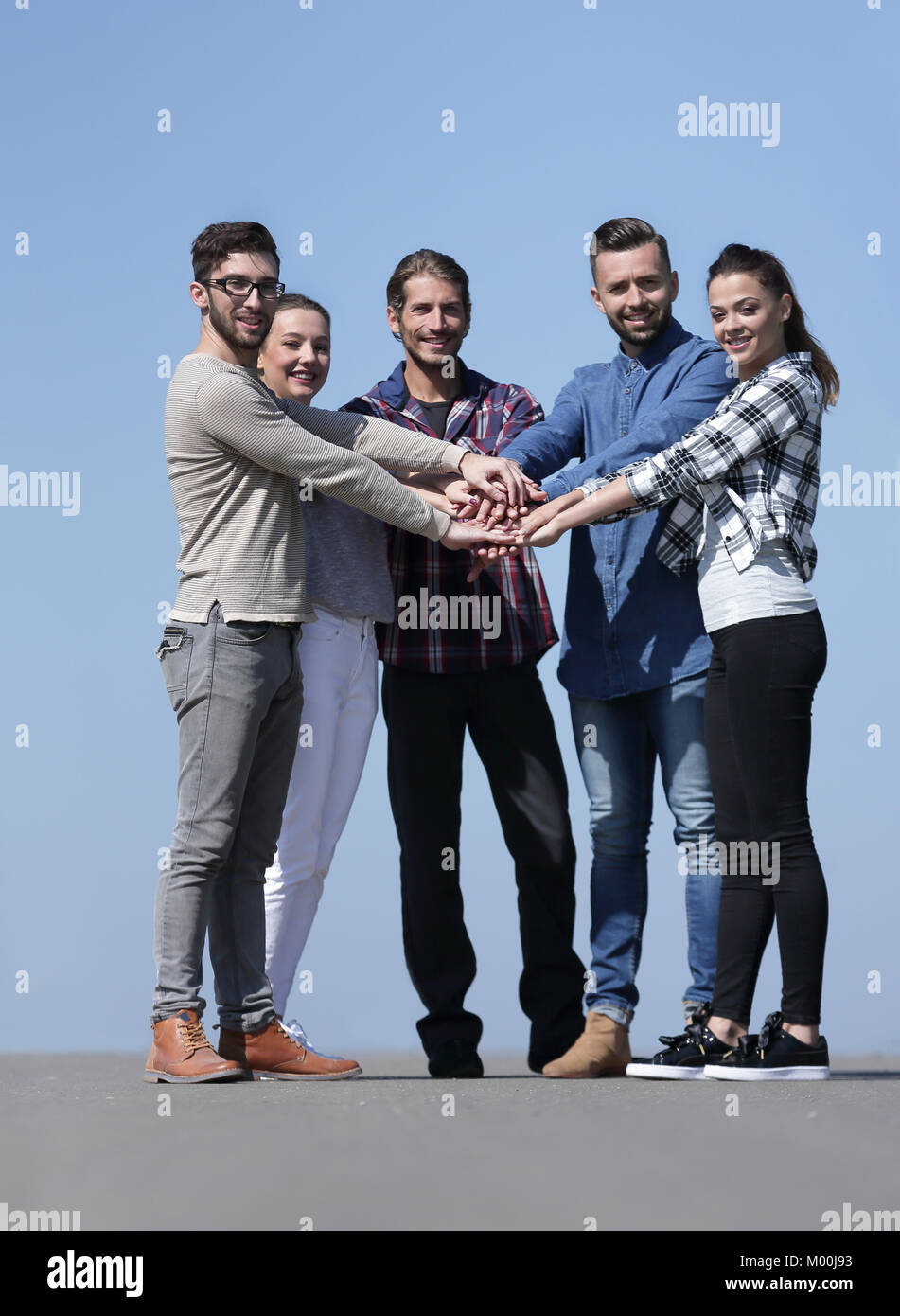 group of young people clasped their hands together Stock Photo - Alamy