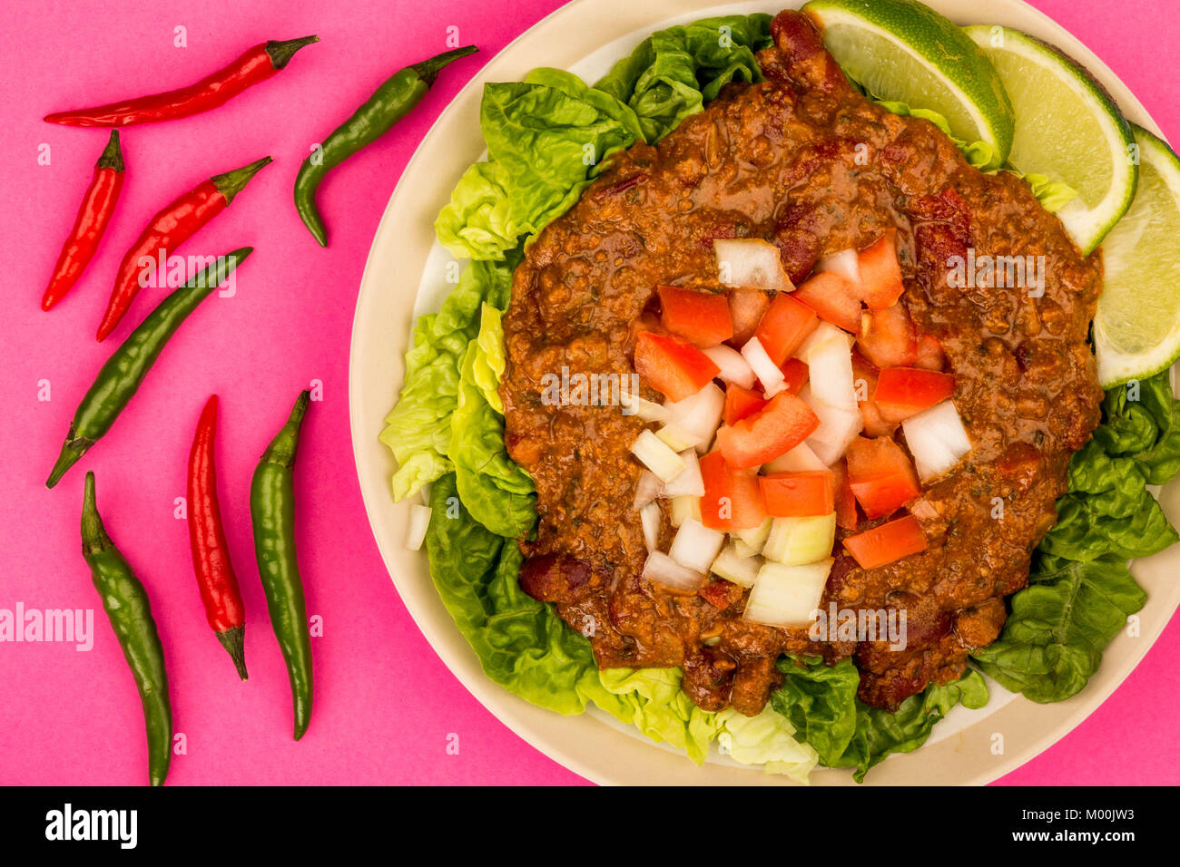 Spicy Mexican Style Beef Taco Meat and Salad With Fresh Limes Against A ...