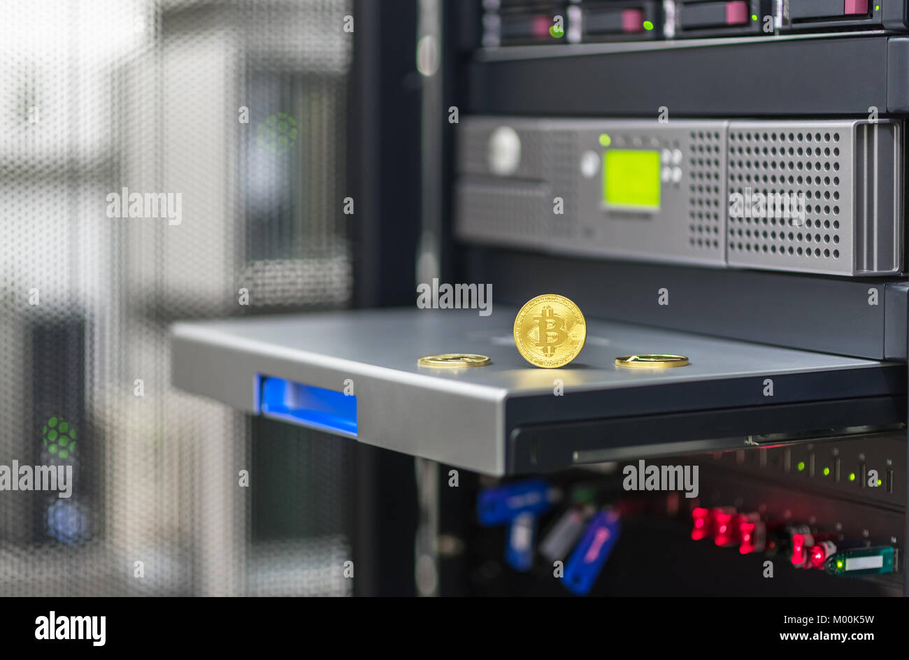 Bitcoin, litecoin ethereum on PC in the server room, golden coins, copy ...