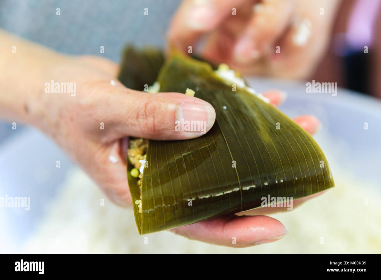 Wrapping rice parcel hi-res stock photography and images - Alamy