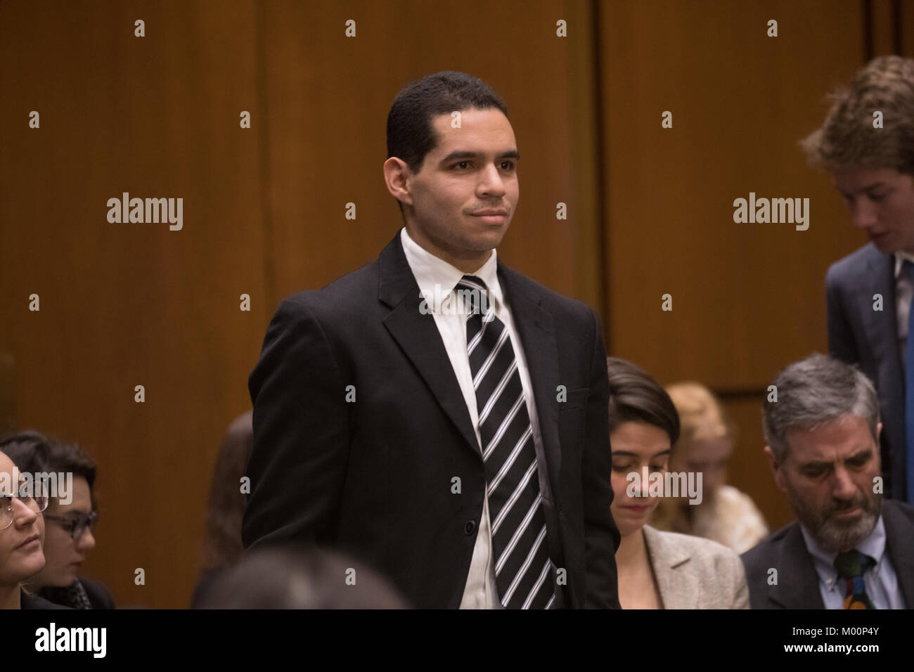 John Magdaleno stands after being introduced by Sen. Dick Durbin (D-Ill ...