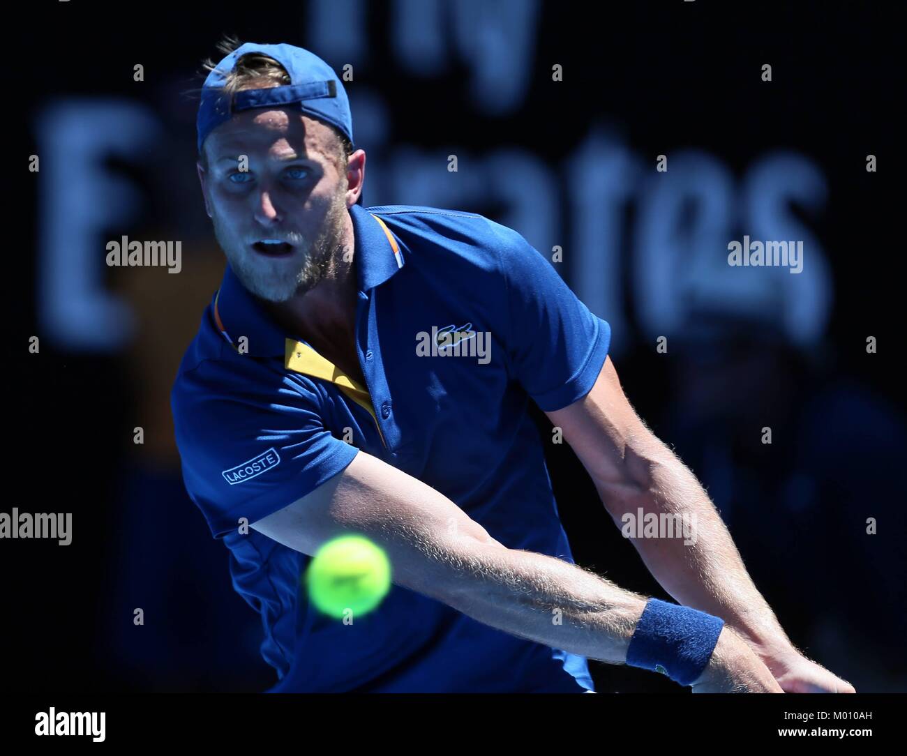 Melbourne, Australia. 18th Jan, 2018. Denis Kudla of the U.S. returns a ...