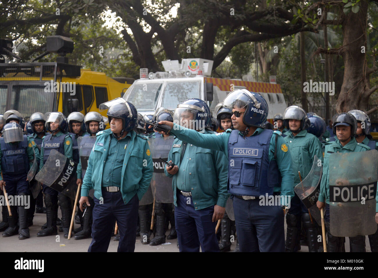 Dhaka, Bangladesh. 17th Jan, 2018. Anti-riot police stand guard while ...
