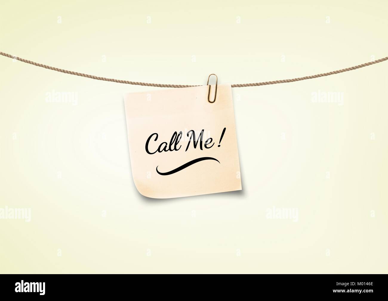 call me text on post it on wash line Stock Photo - Alamy