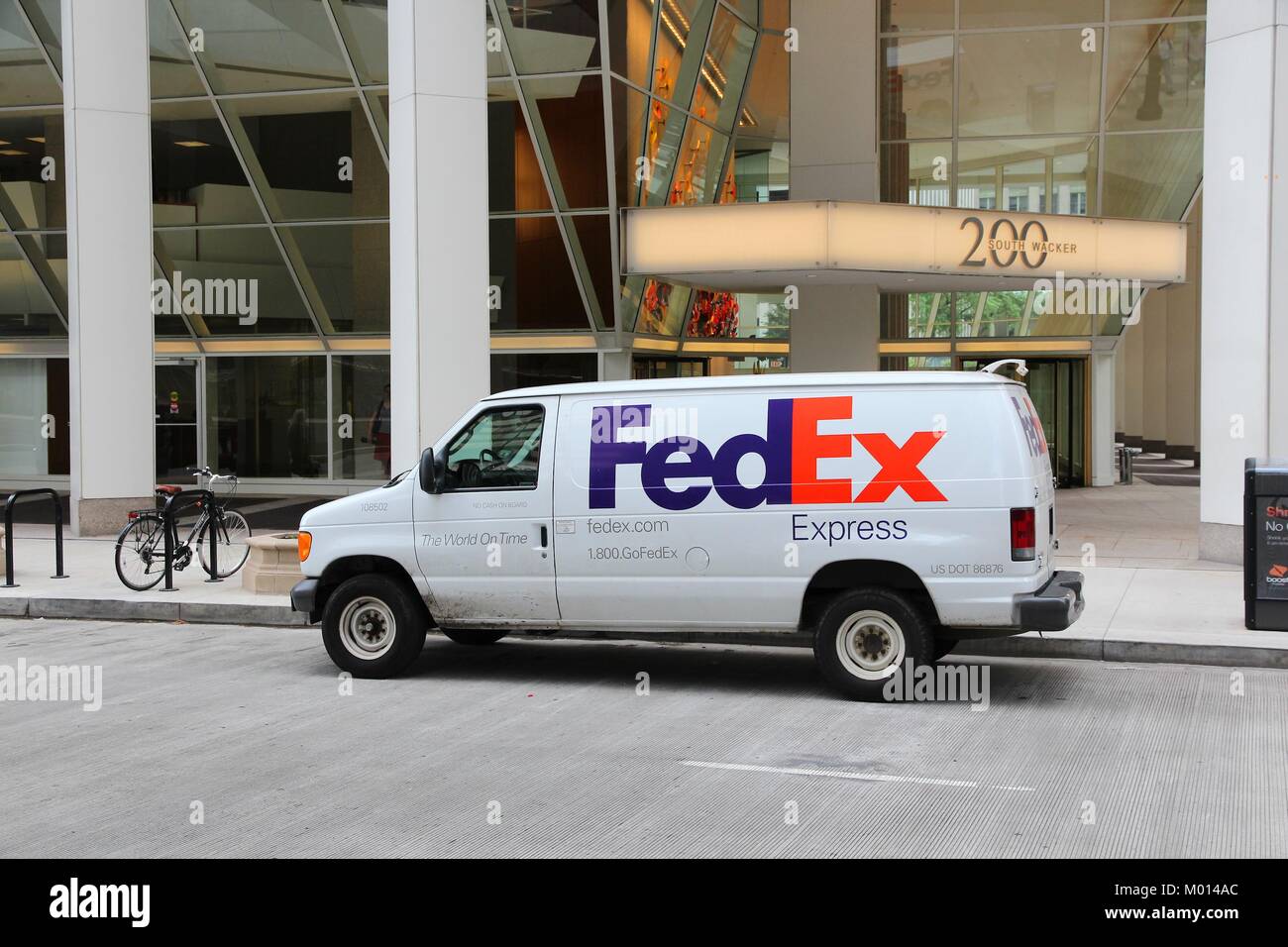 CHICAGO - JUNE 26: Fedex delivers packages on June 26, 2013 in Chicago ...