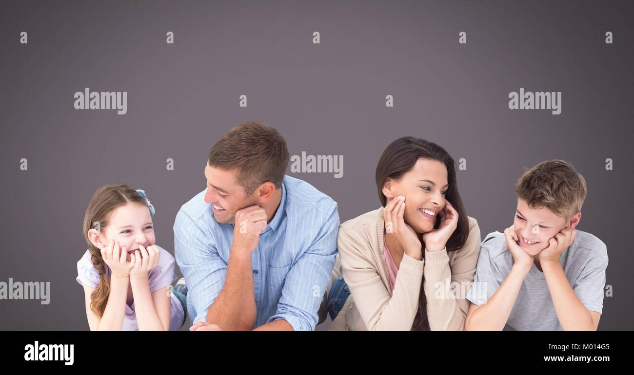 Family laughing together with grey background Stock Photo - Alamy