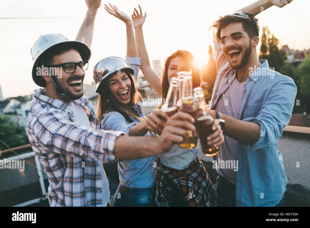 Happy friends laughing and smiling outdoors Stock Photo - Alamy