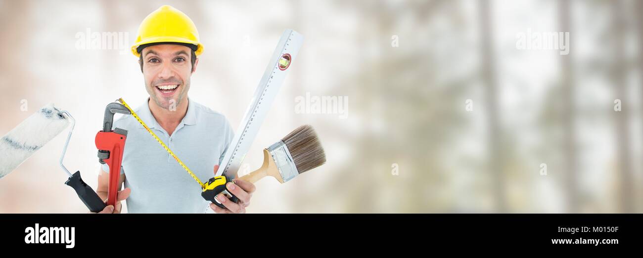 Construction Worker on building site with tools Stock Photo - Alamy