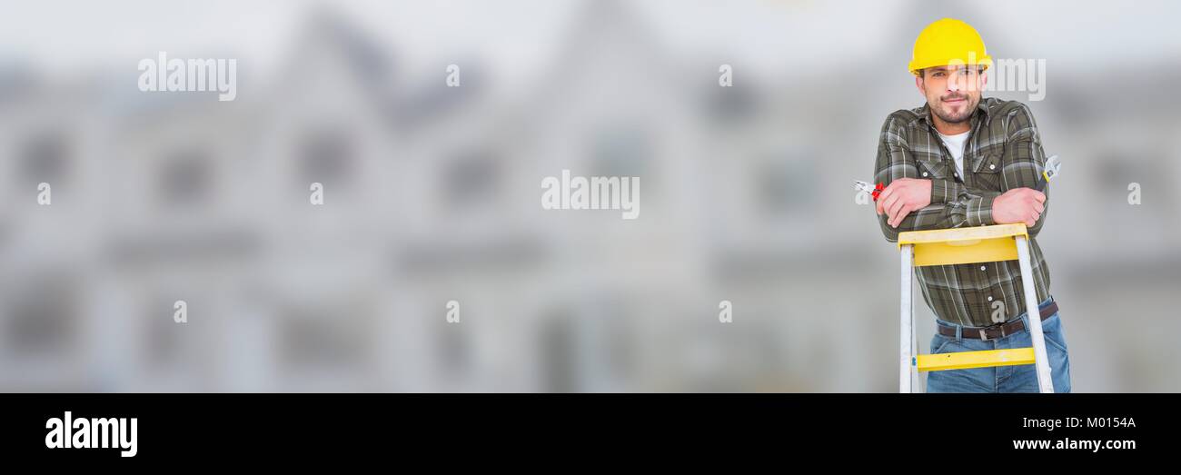 Construction Worker on building site up ladder Stock Photo - Alamy