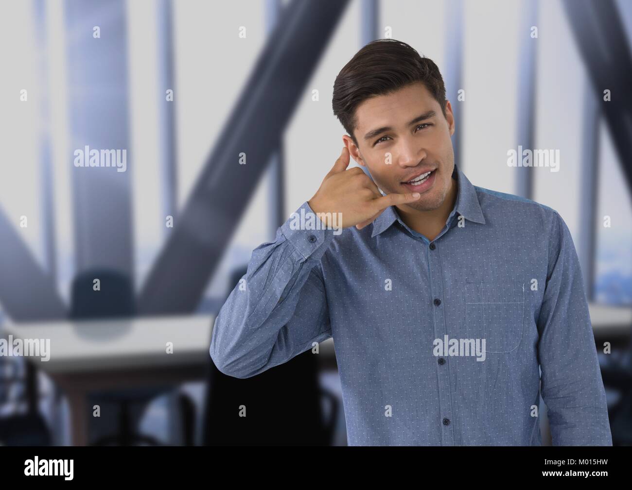 man smiling with ring me sign Stock Photo - Alamy