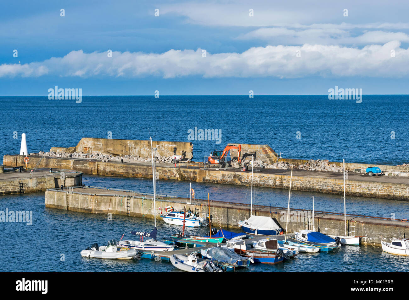 CULLEN MORAY SCOTLAND REPAIRS TO STORM DAMAGED HOLE IN SEA WALL Stock ...