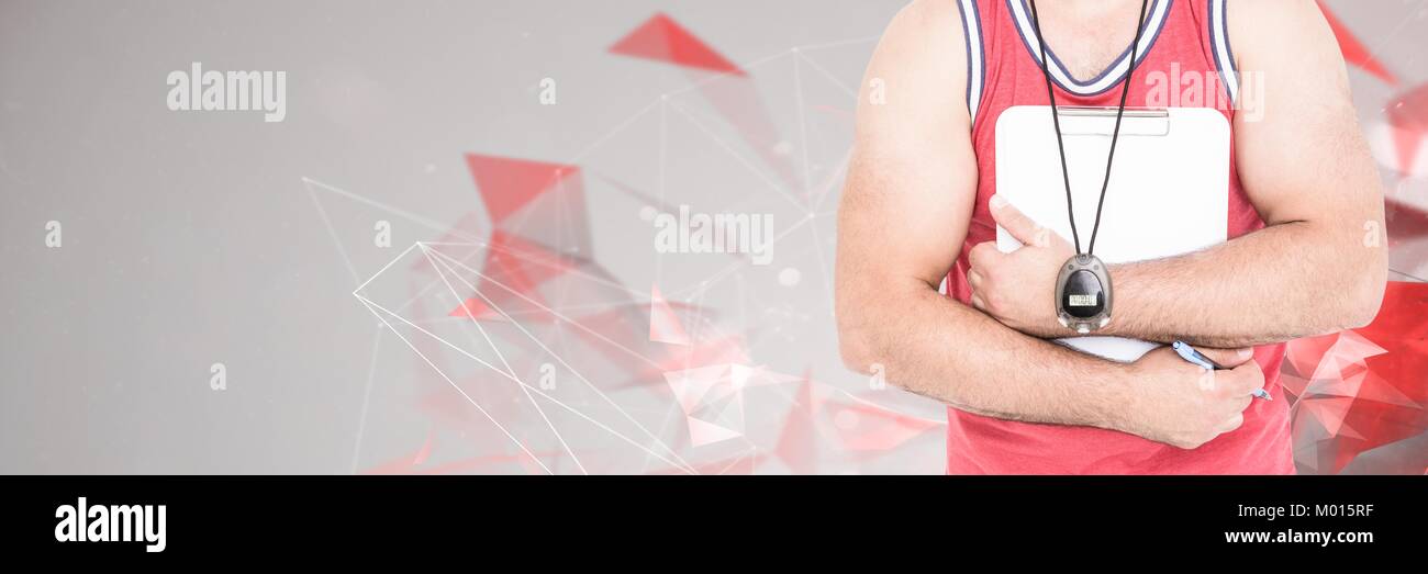 Fitness trainer coach with timer and minimal background Stock Photo - Alamy
