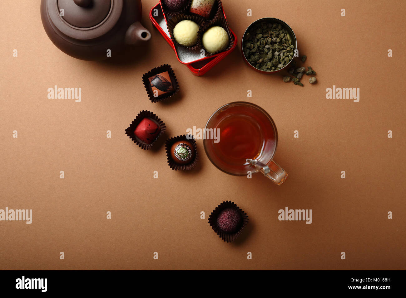 Tea compositions with truffles Stock Photo - Alamy