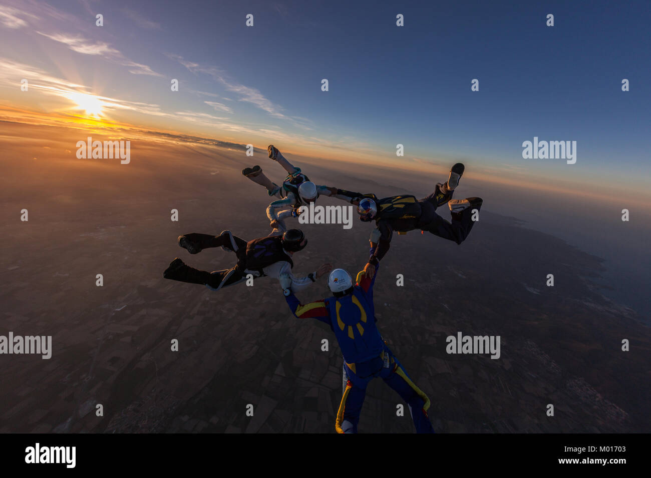 4-Way Sunset Skydive Stock Photo - Alamy
