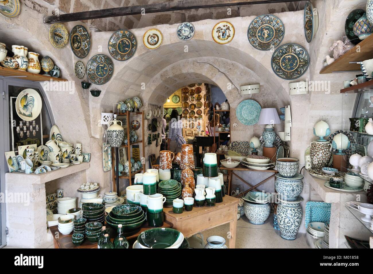 GROTTAGLIE, ITALY - JUNE 3, 2017: People visit a traditional ceramics ...